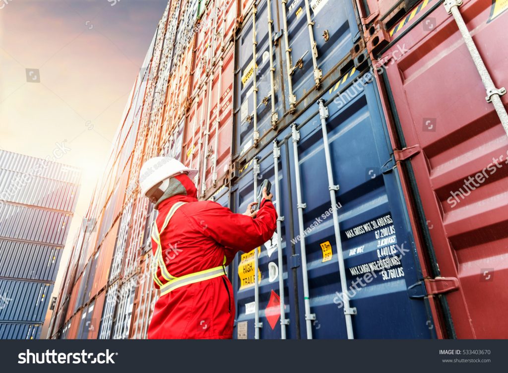 stock-photo-foreman-control-loading-containers-box-from-cargo-freight ...
